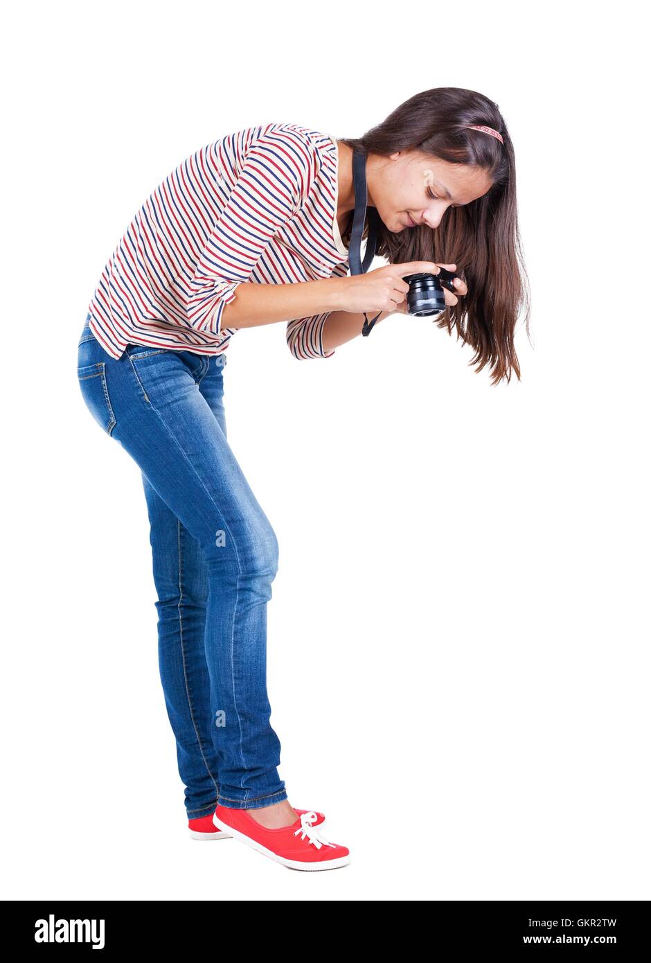 Back view of woman photographing Stock Photo - Alamy