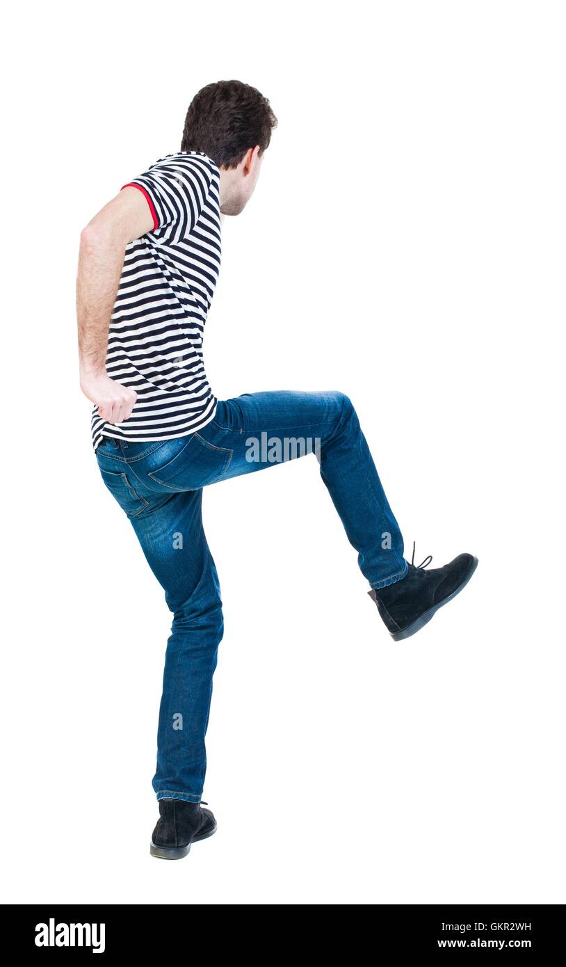 back view of skinny guy funny fights waving his arms and legs Stock ...