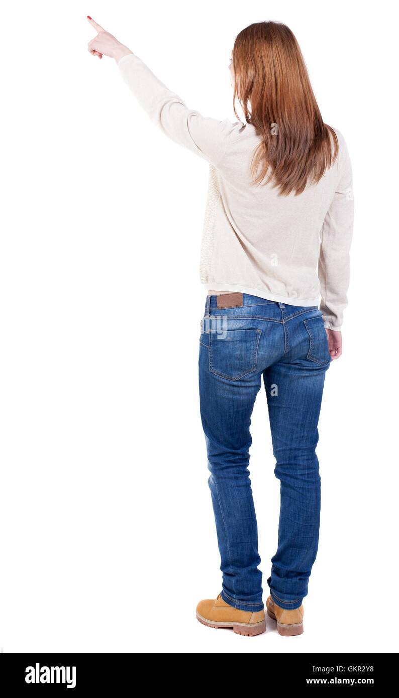 Back view of pointing woman Stock Photo - Alamy