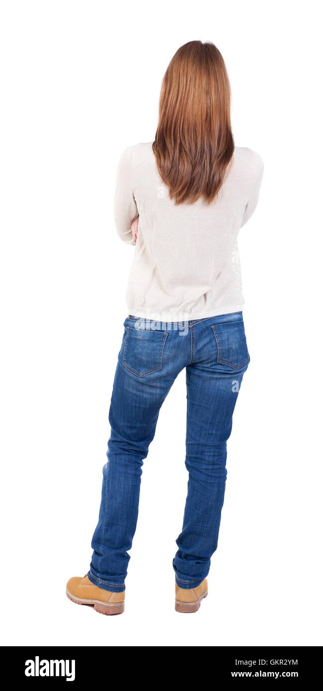back view of standing young beautiful woman in jeans Stock Photo - Alamy