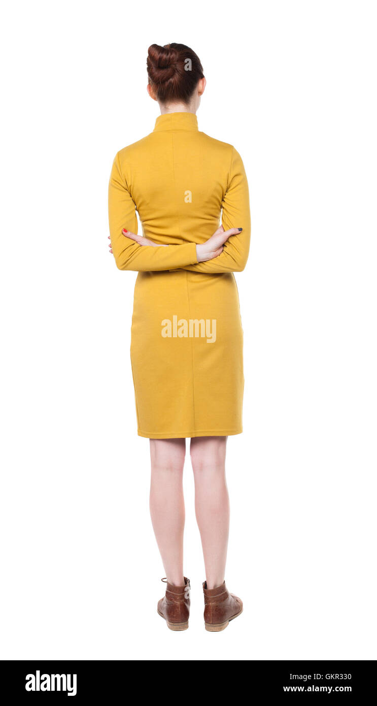 back view of standing young beautiful woman. girl watching Stock Photo ...