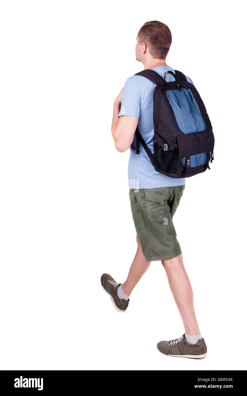 back view of walking man with backpack Stock Photo - Alamy