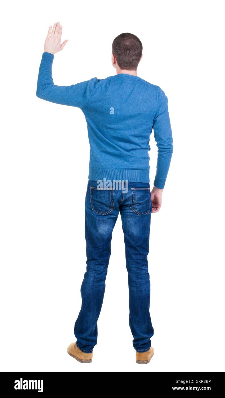 Back view of handsome man in blue pullover looking up Stock Photo - Alamy
