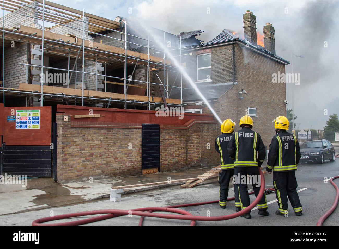 London firefighters at the scene of a hotel fire in East London as ...