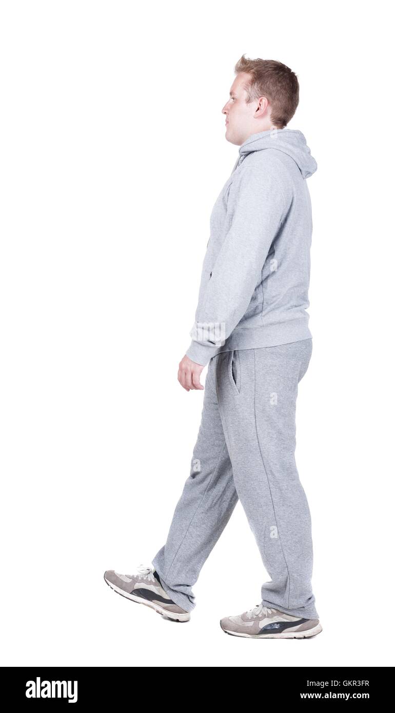 Back view of going sportsman Stock Photo - Alamy