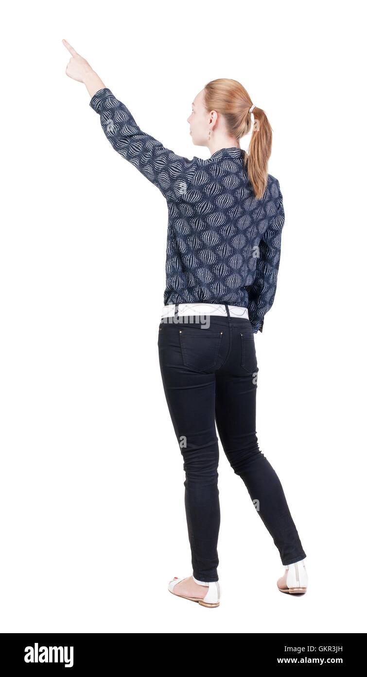 Back view of pointing woman Stock Photo - Alamy