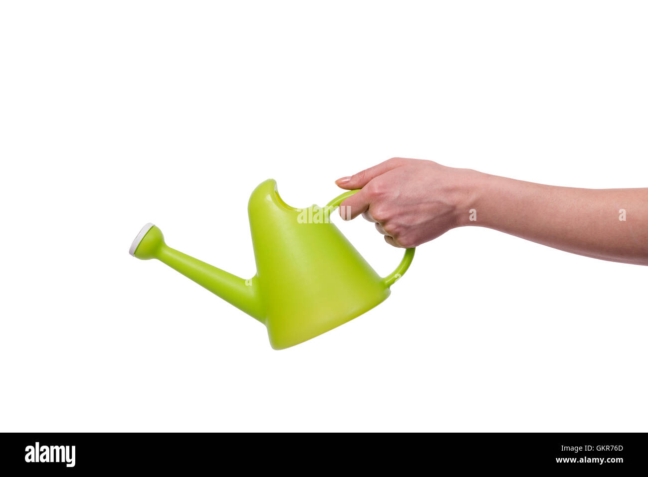 Hand holding watering can isolated on white Stock Photo - Alamy