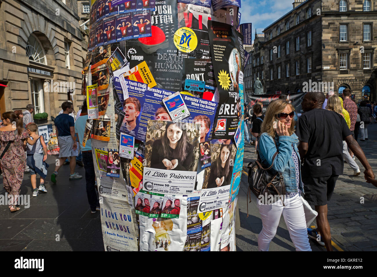Posters and fliers attached to a pillar on the High street during the ...