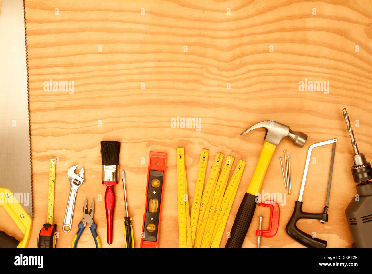 Assorted work tools on wood Stock Photo - Alamy