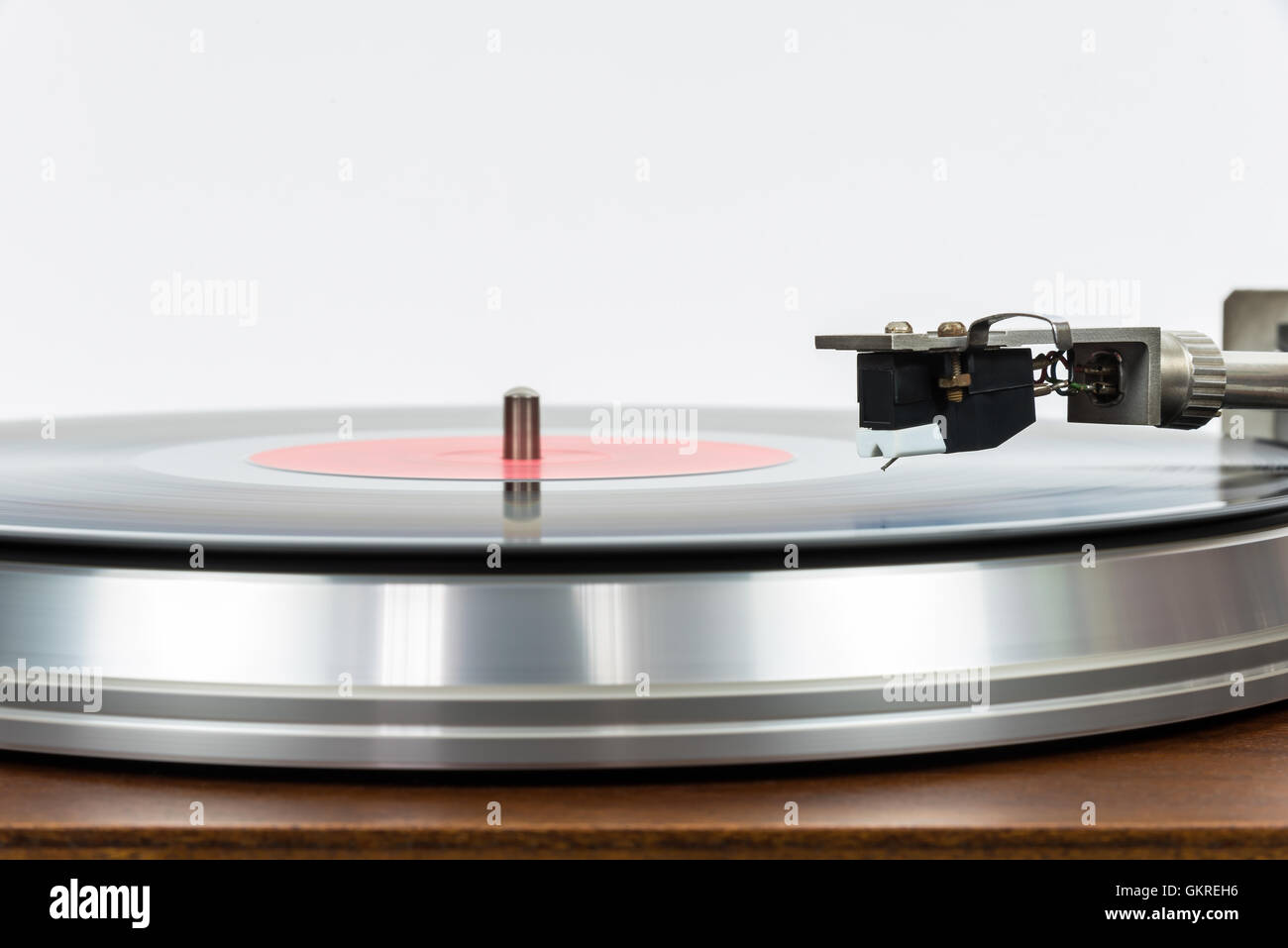 Closeup of turntable with vinyl record on white background Stock Photo ...