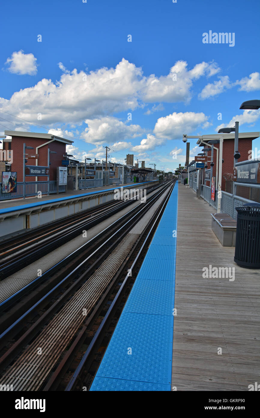 The elevated train tracks of the CTA Brown line head north at the ...