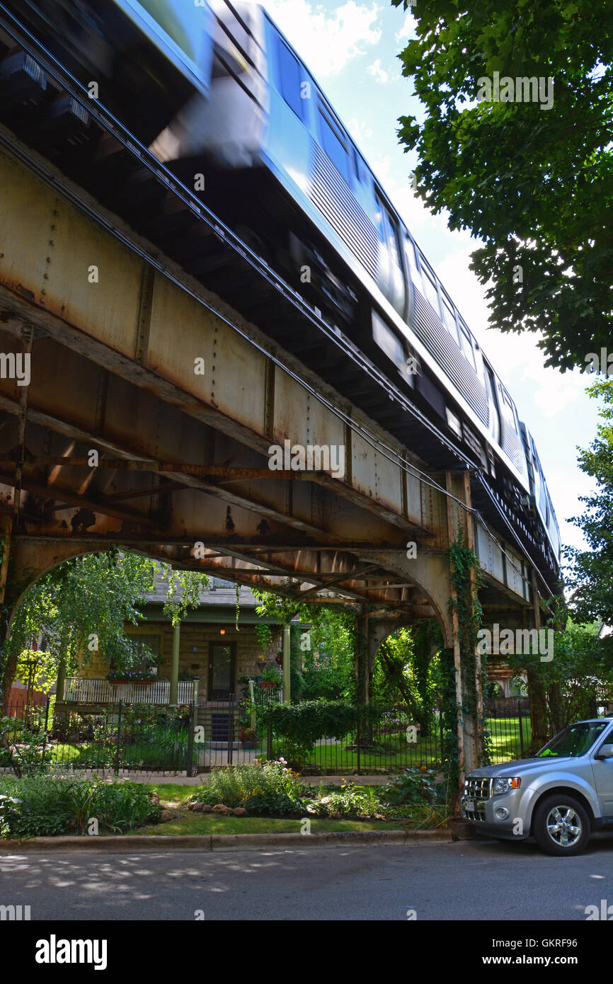 The Brown Line elevated CTA train tracks passing through yards in the ...