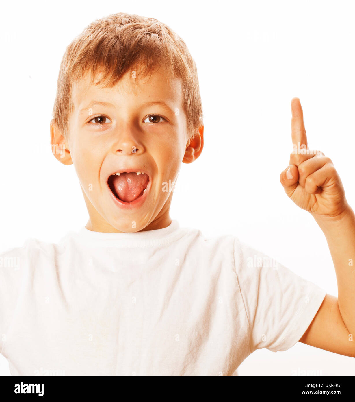 little cute white boy pointing in studio isolated close up Stock Photo ...