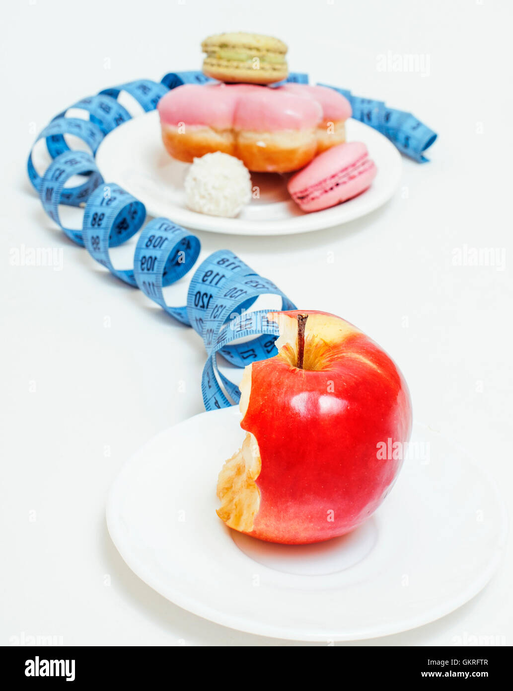 New diet concept, measurement tape in shape of question mark between ...