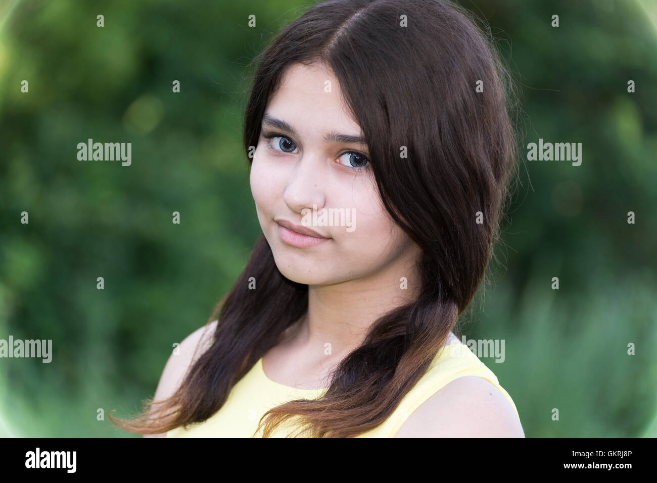 beautiful girl with black hair outdoor Stock Photo - Alamy