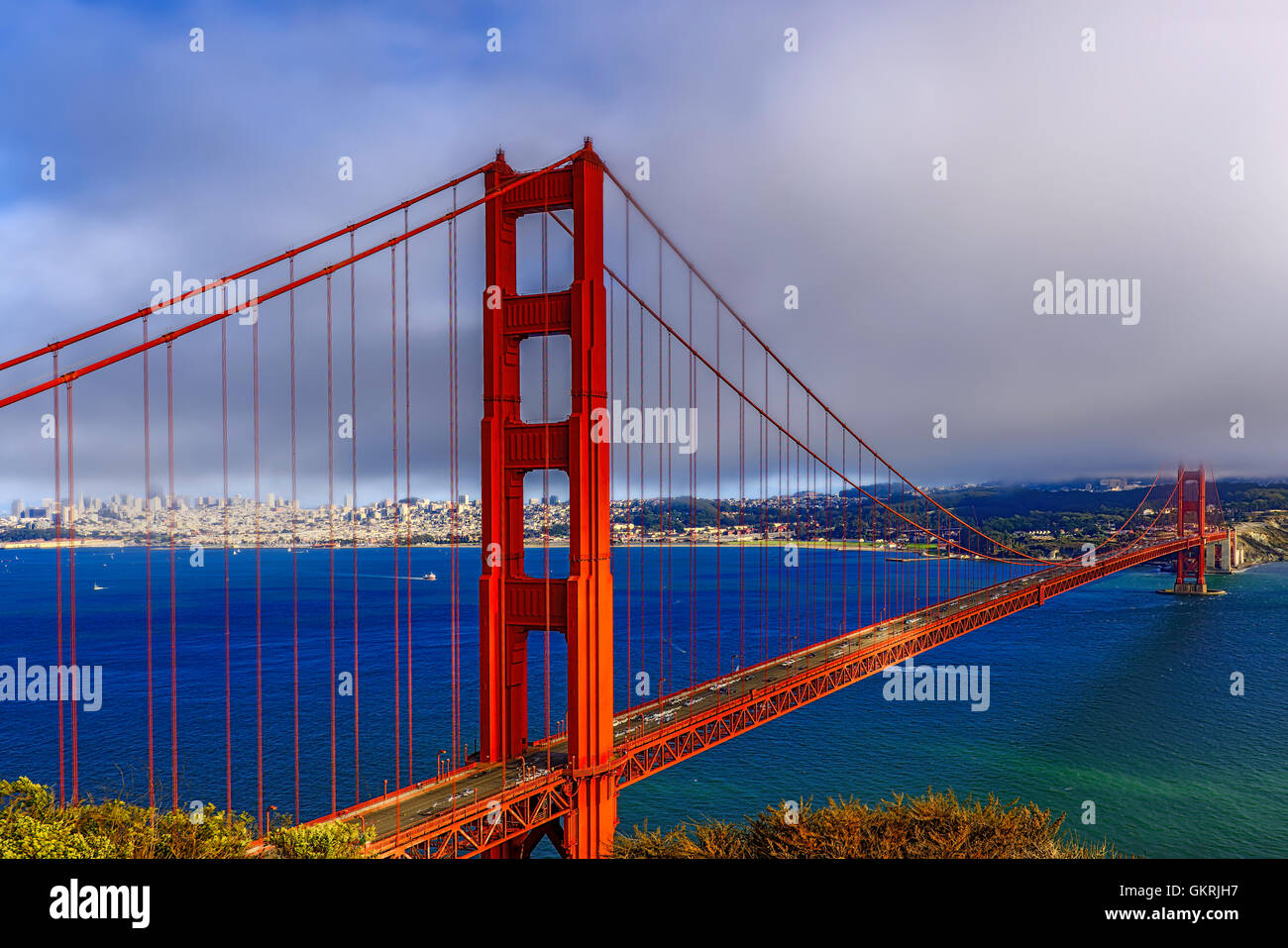 The iconic Golden Gate bridge spans the Golden Gate strait in the city ...