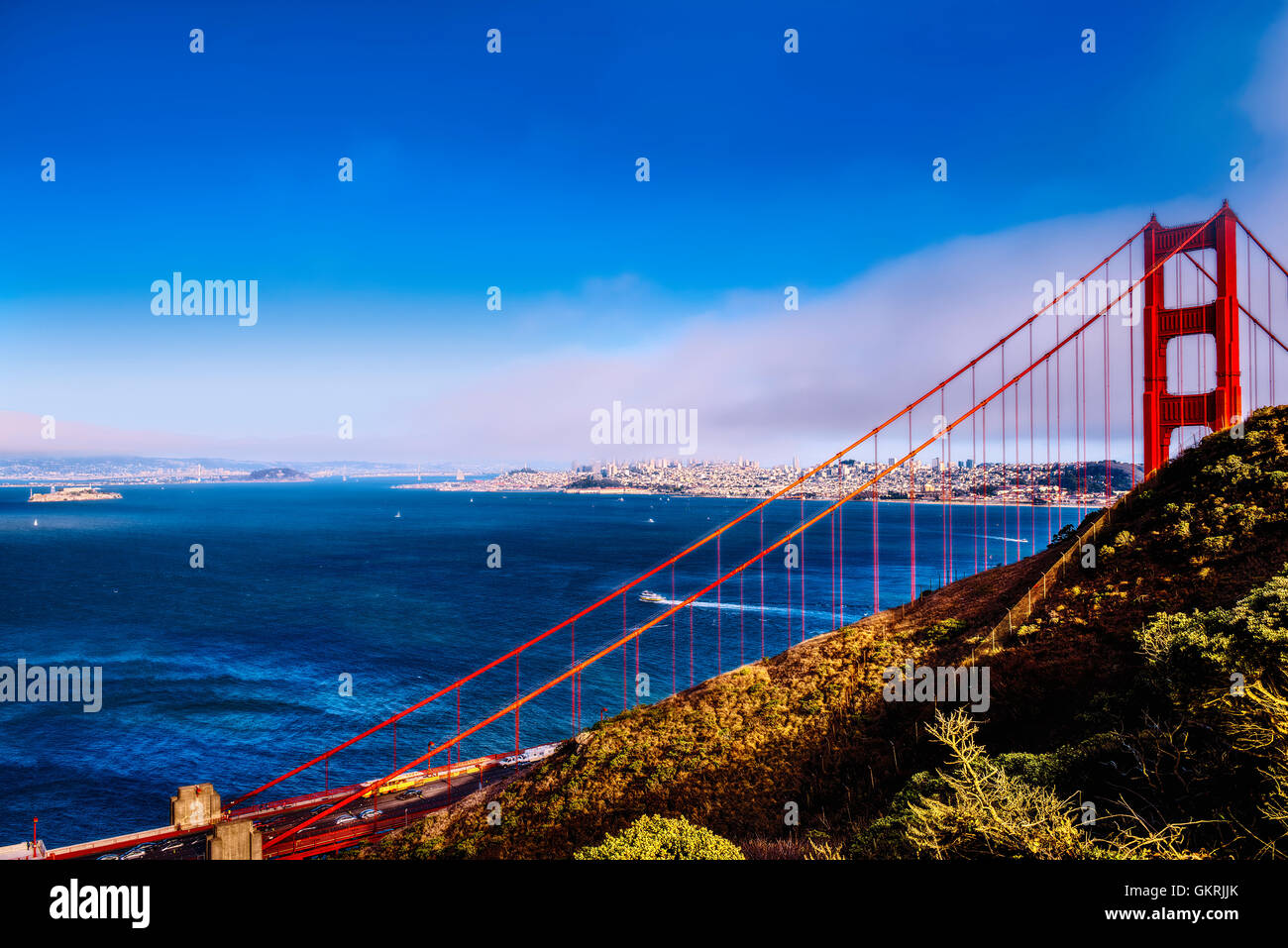 The iconic Golden Gate bridge spans the Golden Gate strait in the city ...