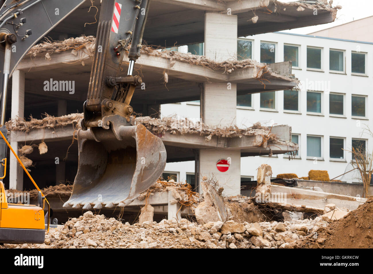 Destruction of concrete building with equipment Stock Photo - Alamy