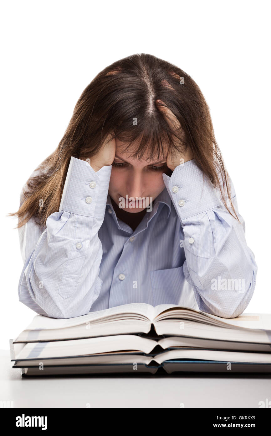 Beauty smiling woman reading books at desk Stock Photo - Alamy