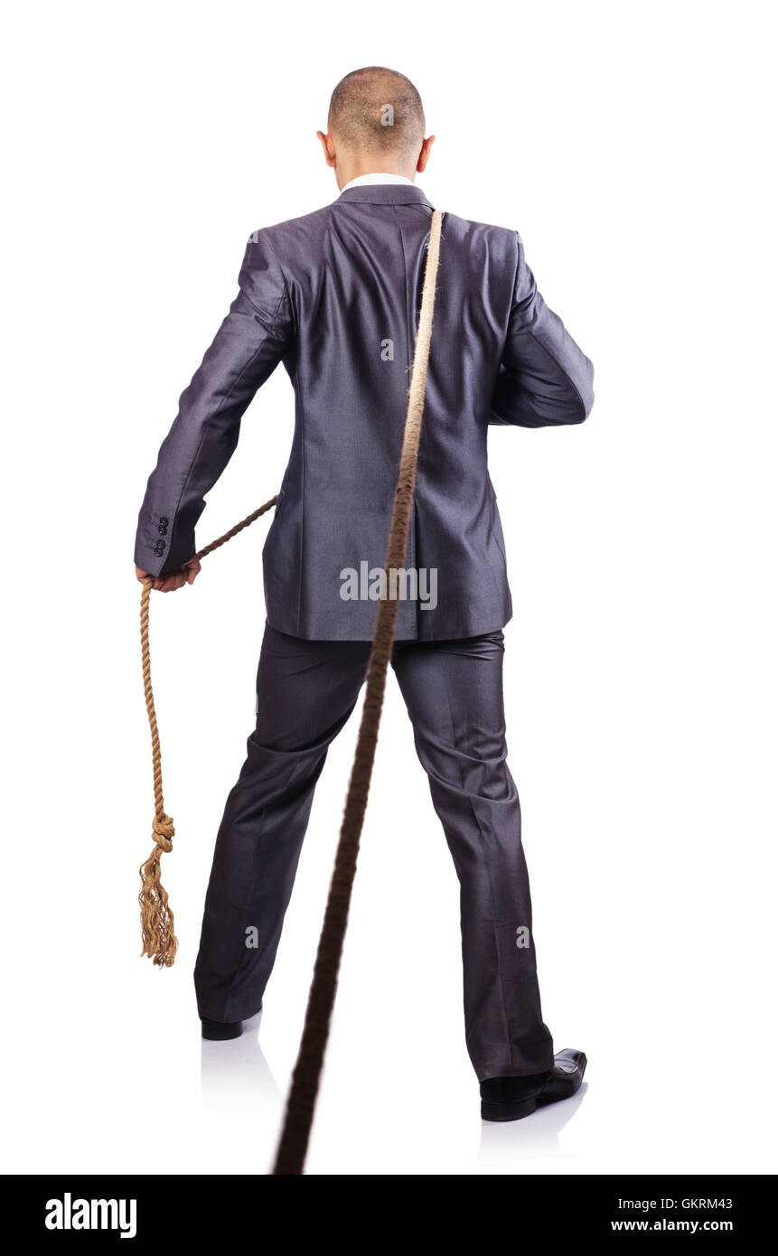 Man pulling the rope on white Stock Photo - Alamy
