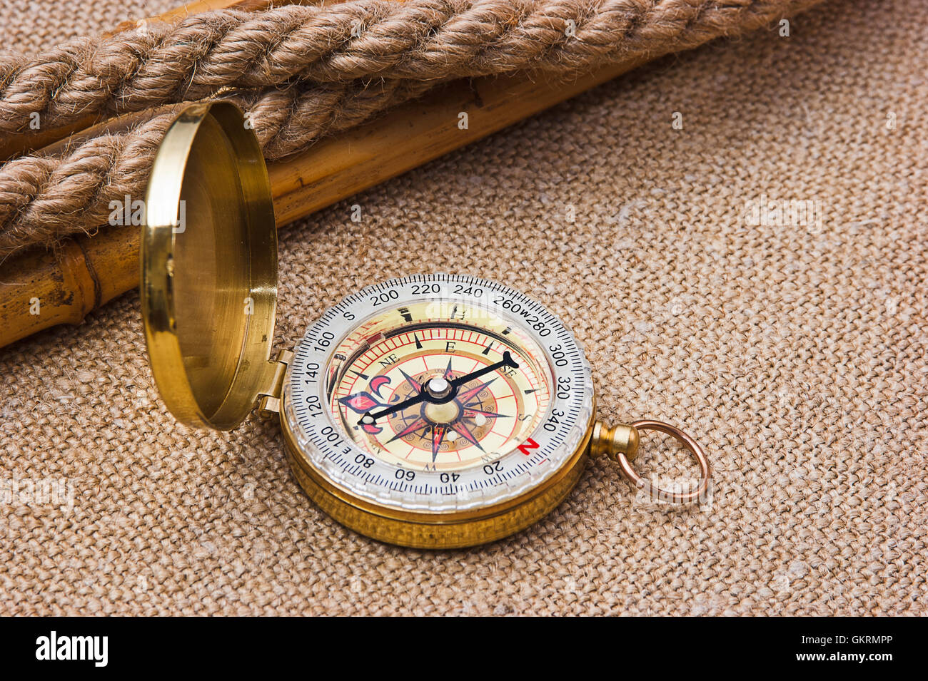 Compass with a rope Stock Photo - Alamy