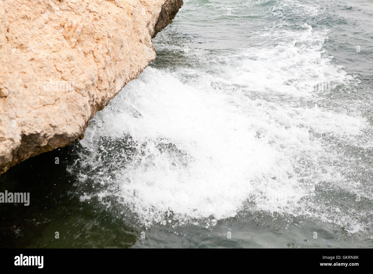 wave and stone Stock Photo - Alamy