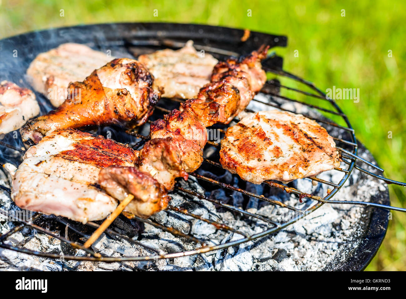 Barbecue grill with various kinds of meat, close-up Stock Photo - Alamy