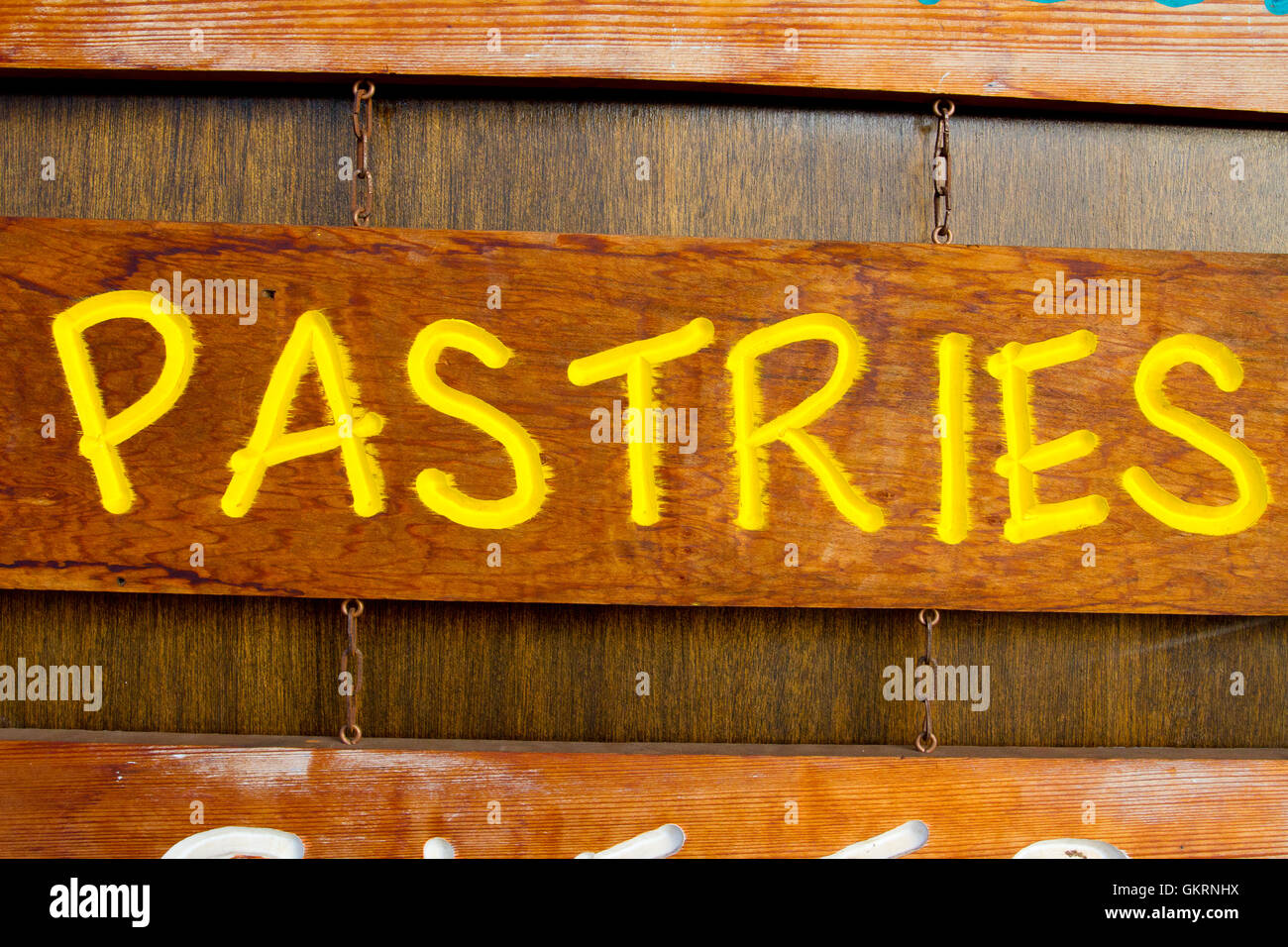 Pastries Wood Sign Stock Photo - Alamy