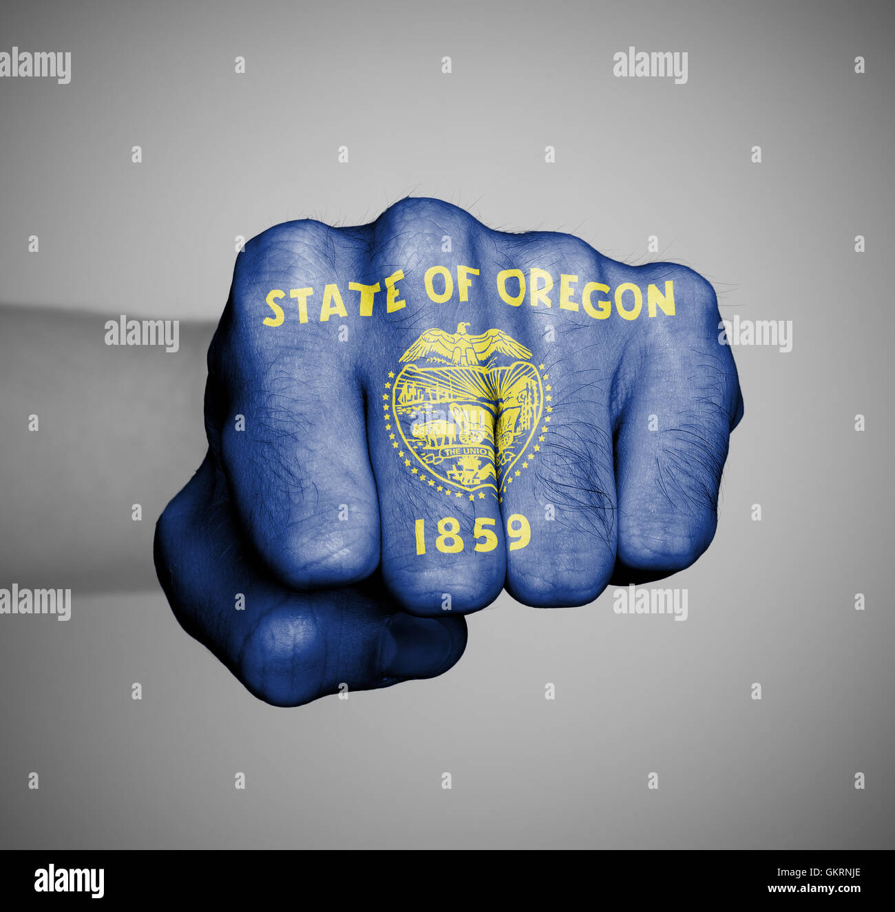 United states, fist with the flag of Oregon Stock Photo - Alamy