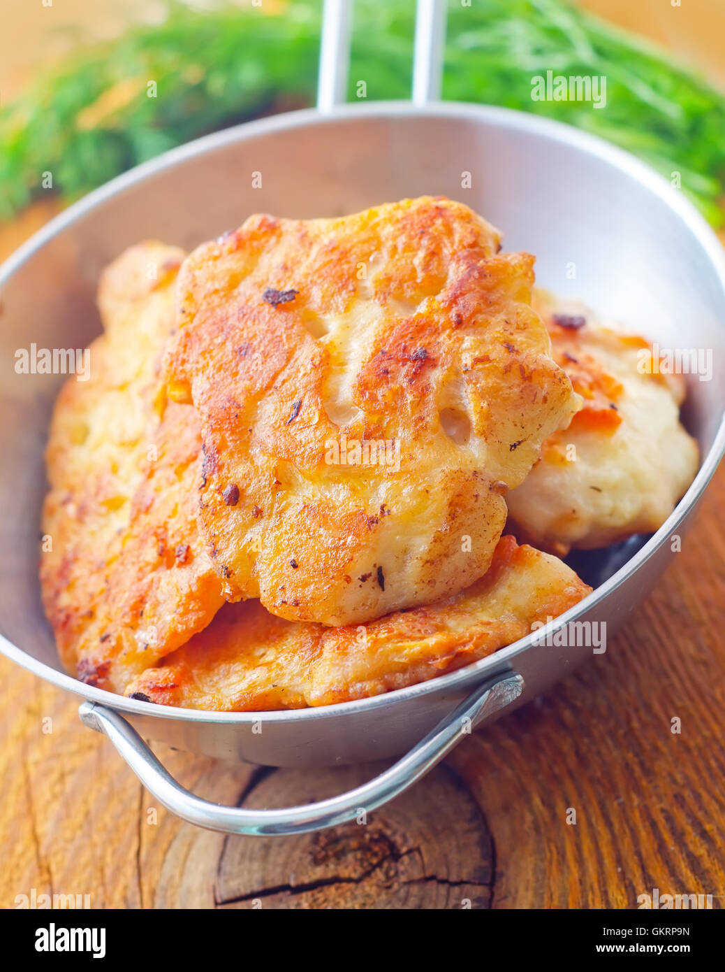 Fried cutlets from chicken with the greens Stock Photo - Alamy