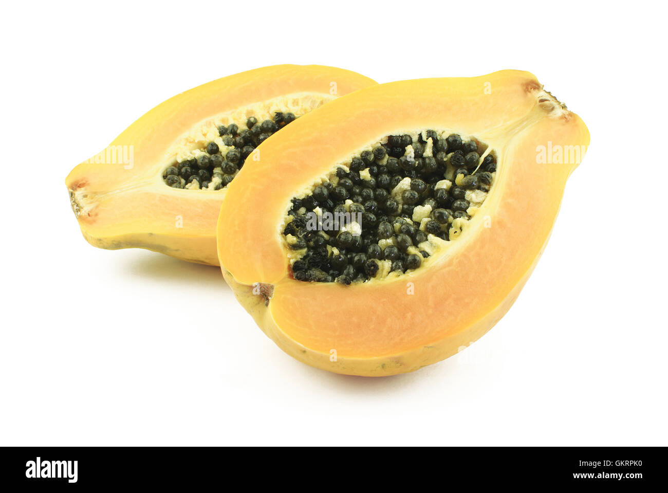 Two halves of papaya Stock Photo - Alamy