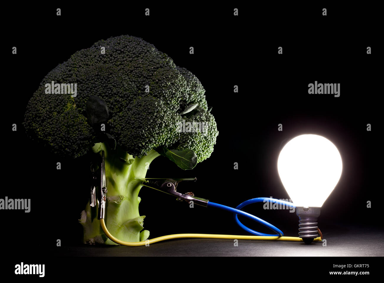 Vegetable powering a light bulb Stock Photo - Alamy