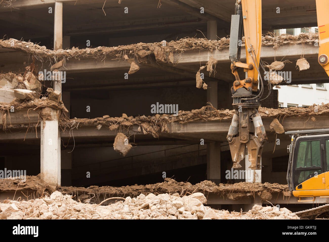 Destruction of concrete building with equipment Stock Photo - Alamy