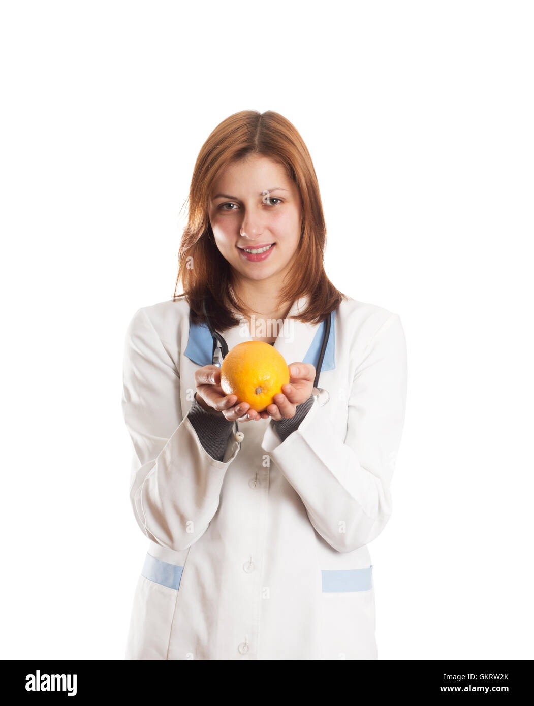 doctor in medical uniform holding an orange in her hands Stock Photo ...