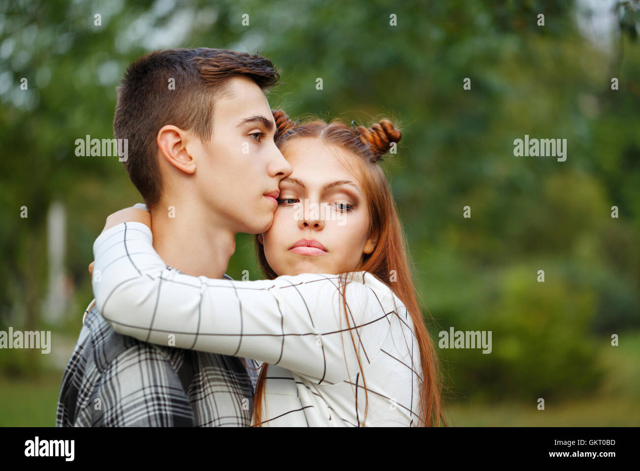 Loving couple teens embrace. Girlfriend and boyfriend together. Close ...