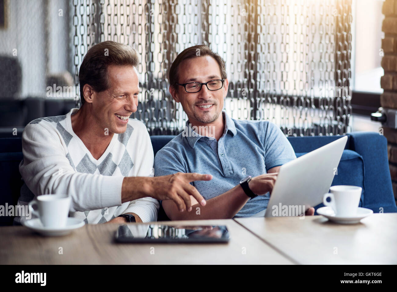 Two men point hi-res stock photography and images - Alamy