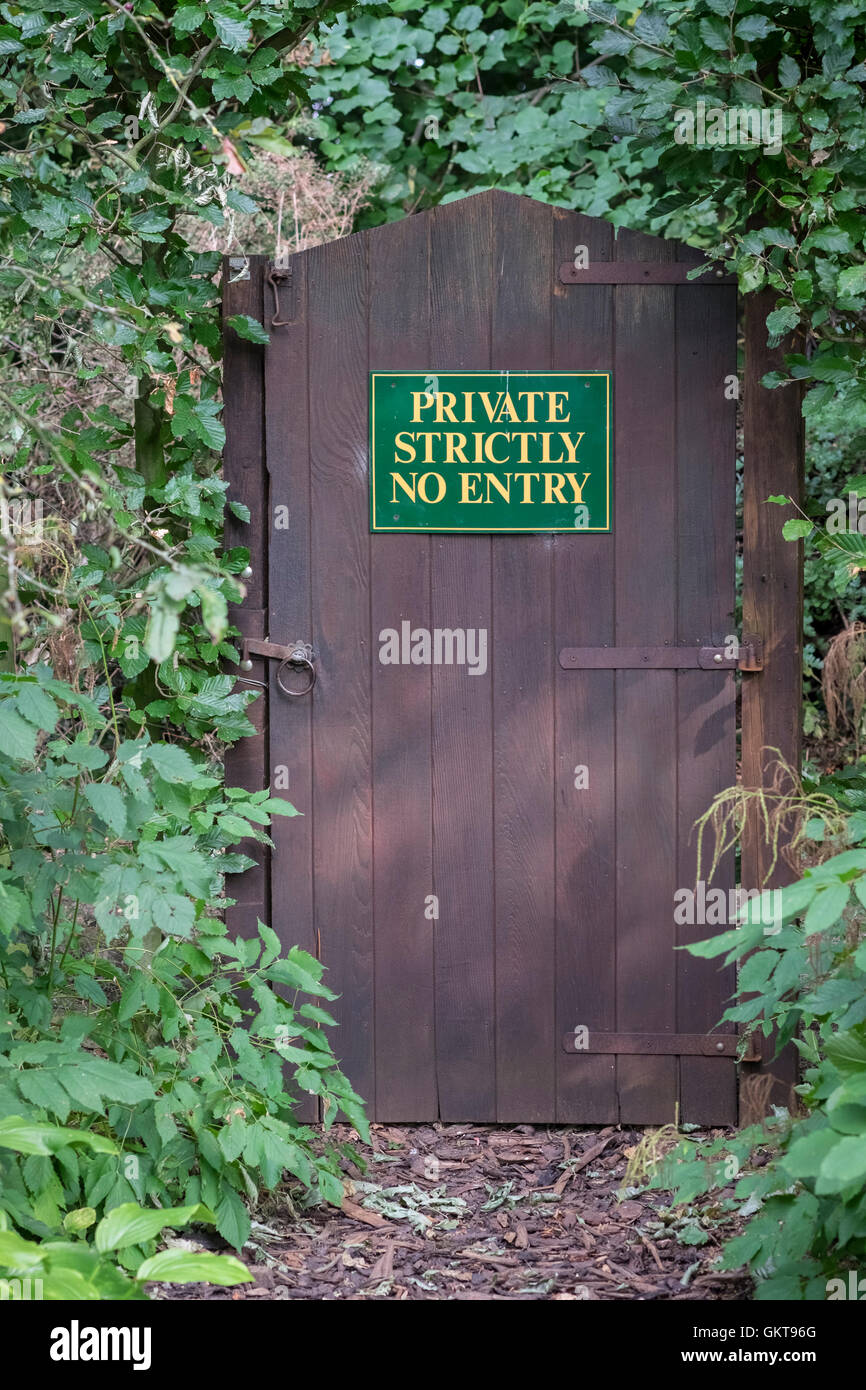 Garden gate with sign saying 'Private Strictly No Entry', England UK ...