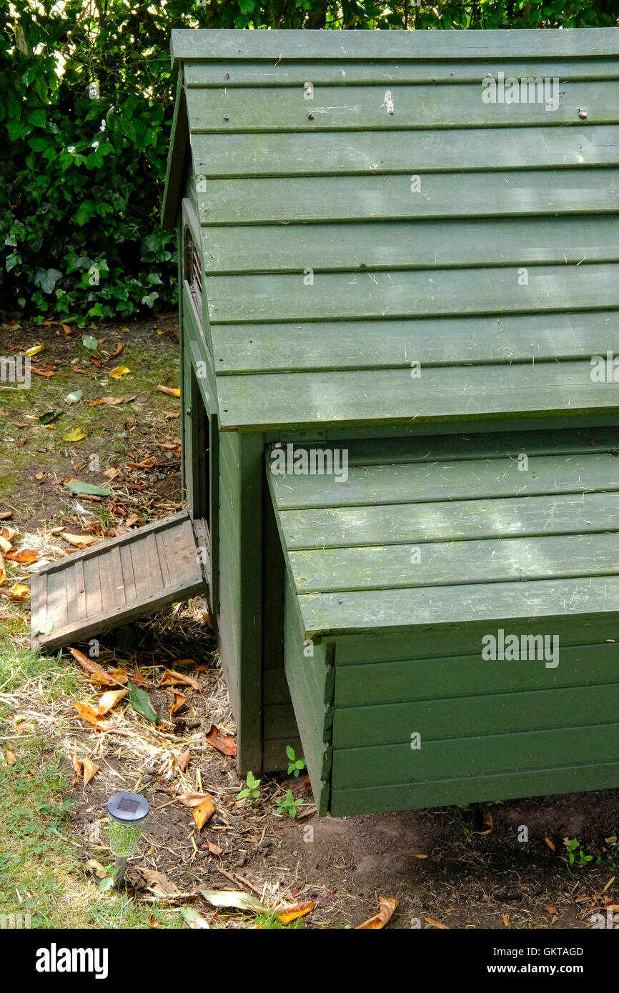 Close-up view of a self-build chicken house, showing the opened door ...