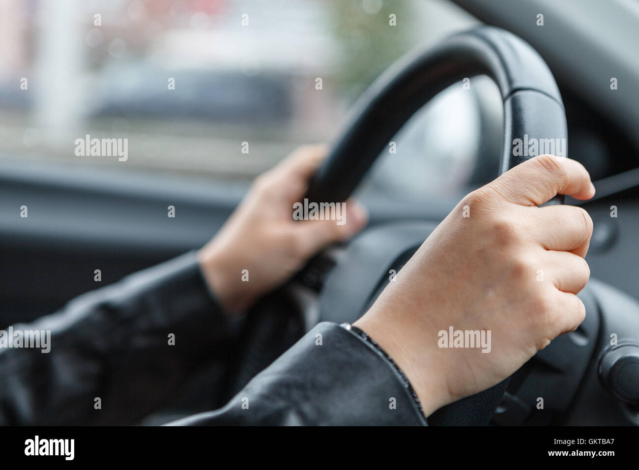 Human hands on wheel hi-res stock photography and images - Alamy