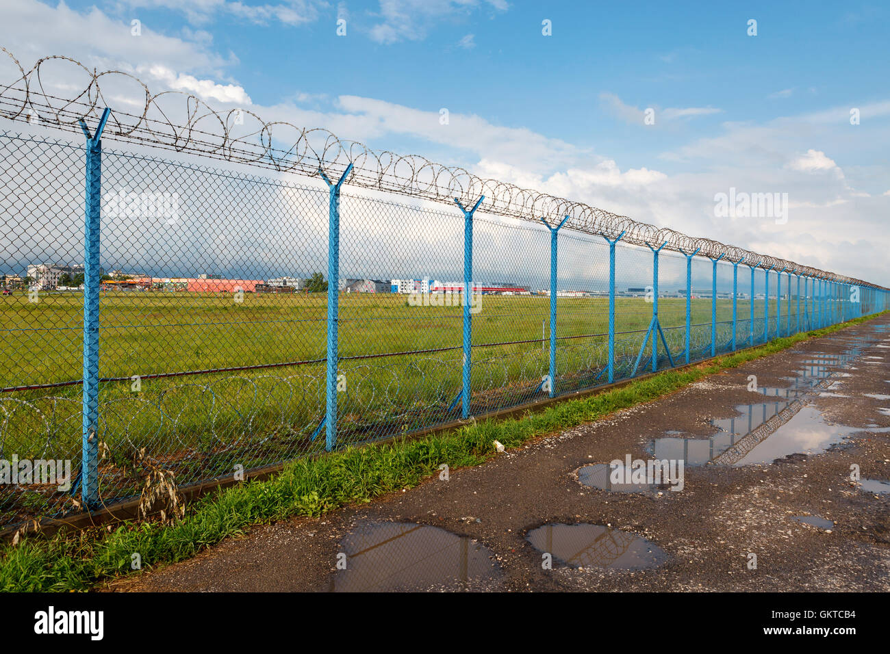 Barbed wire fence of restricted area Stock Photo - Alamy