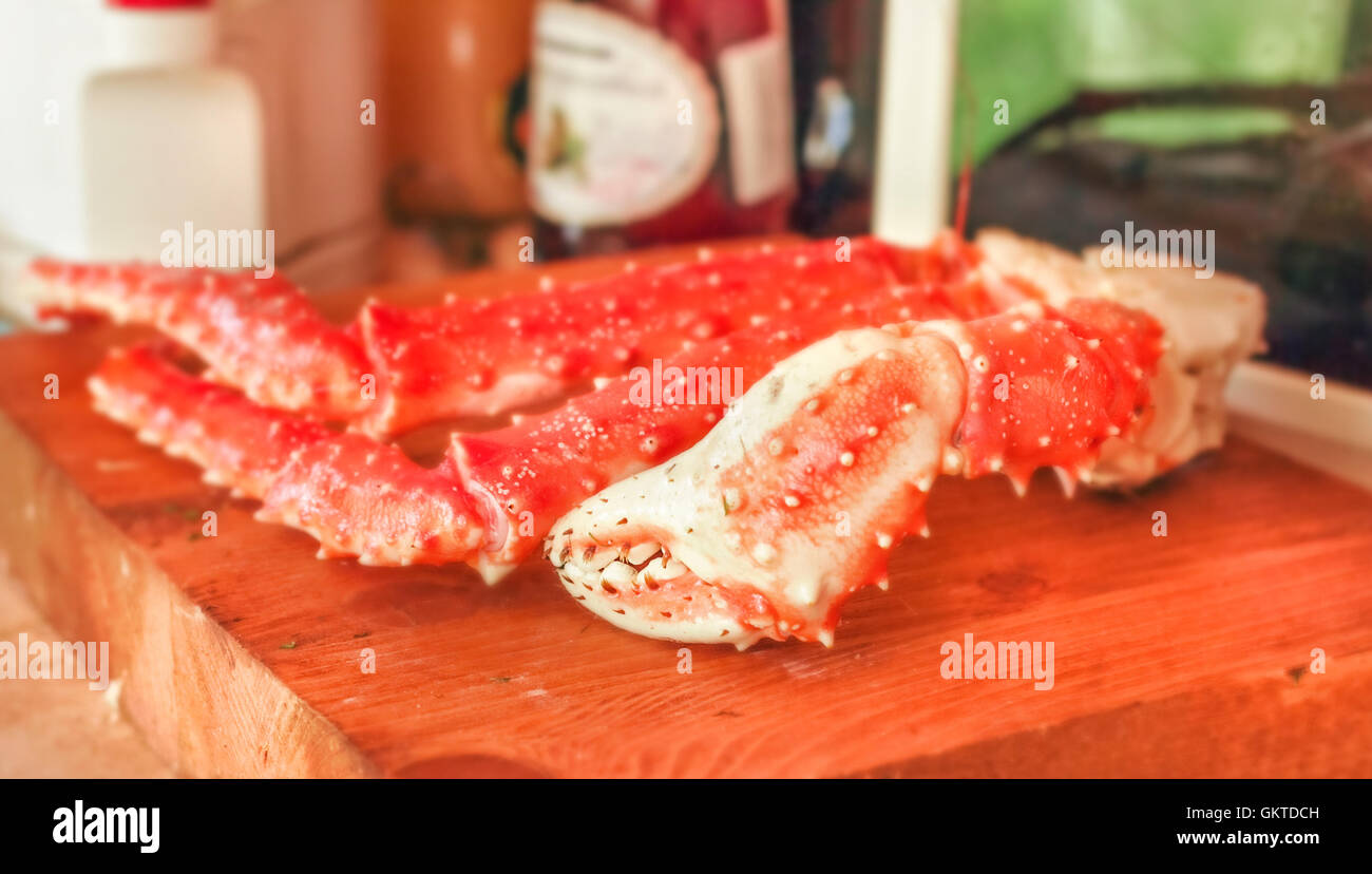 Nice red fresh phalanx crab on wooden plate Stock Photo - Alamy