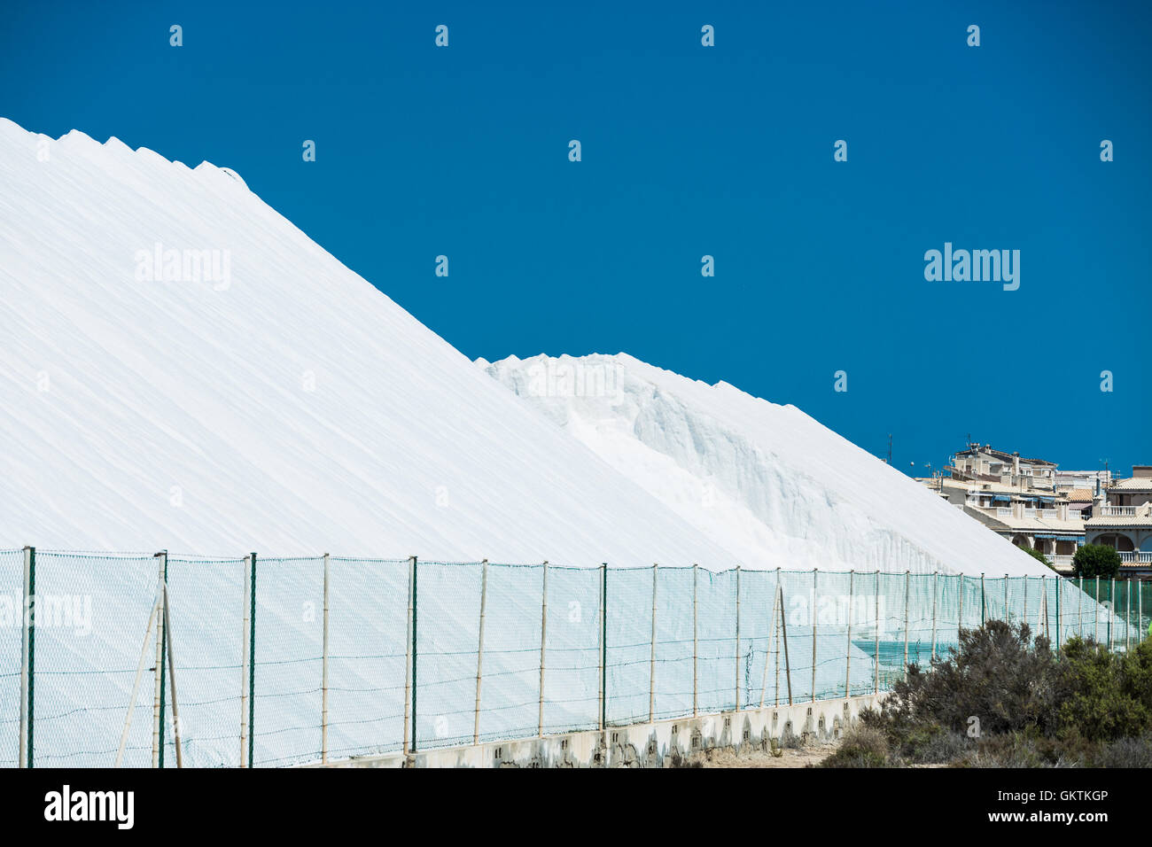 Sea salt production and storage Stock Photo - Alamy