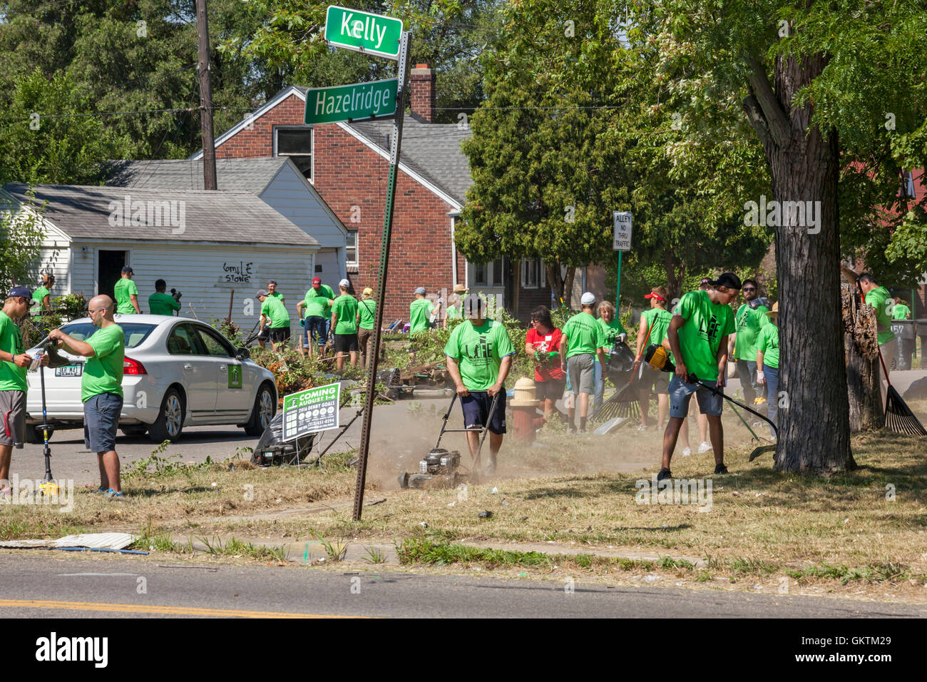 Detroit, Michigan - Volunteers clean up a distressed neighborhood ...