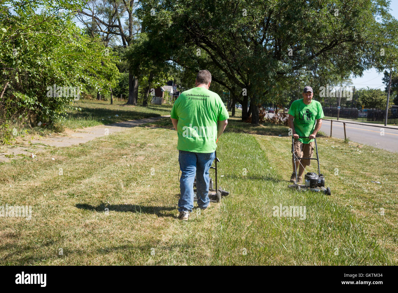 Detroit, Michigan - Volunteers clean up a distressed neighborhood ...