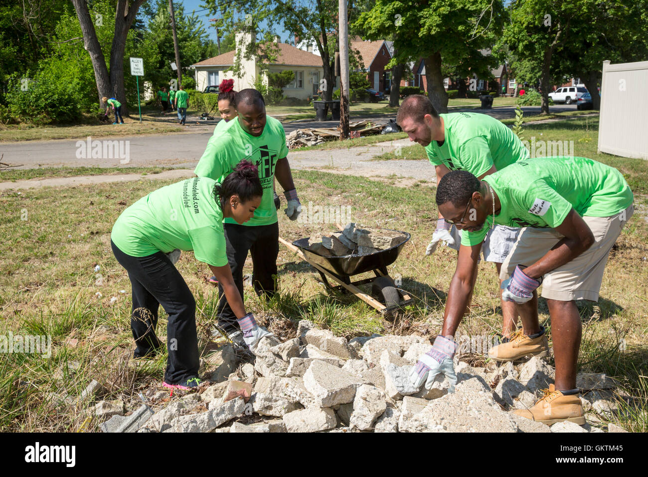 Detroit, Michigan - Volunteers clean up a distressed neighborhood ...
