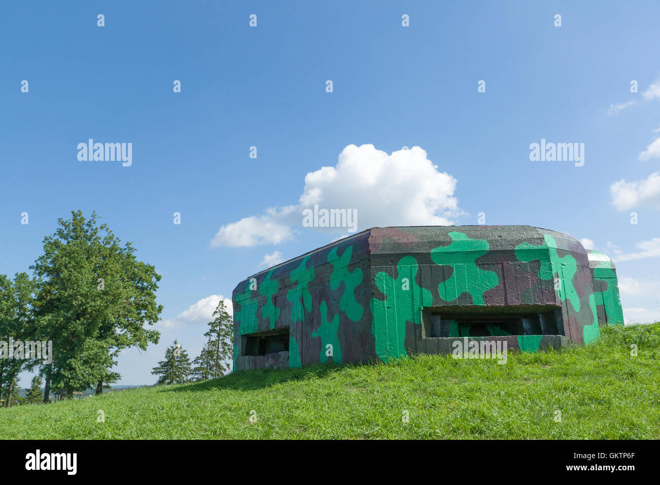 military fortification built of concrete and serves as a point of fire ...