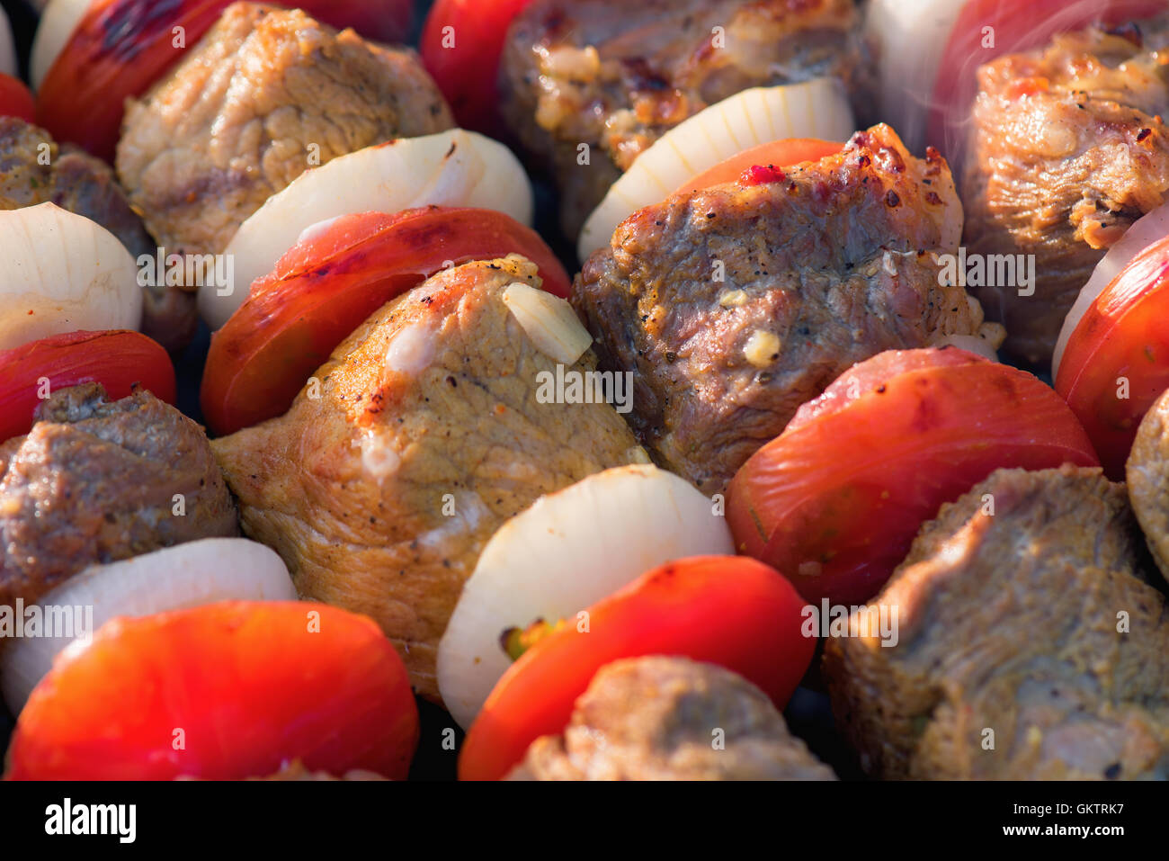 Barbecue with delicious grilled meat Stock Photo - Alamy