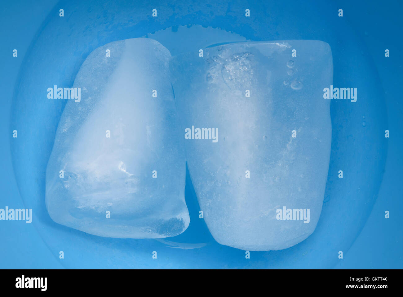 Two melting ice blocks Stock Photo - Alamy