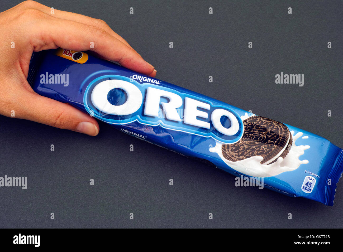 Tambov, Russian Federation - August 12, 2016 Oreo cookies pack in woman ...