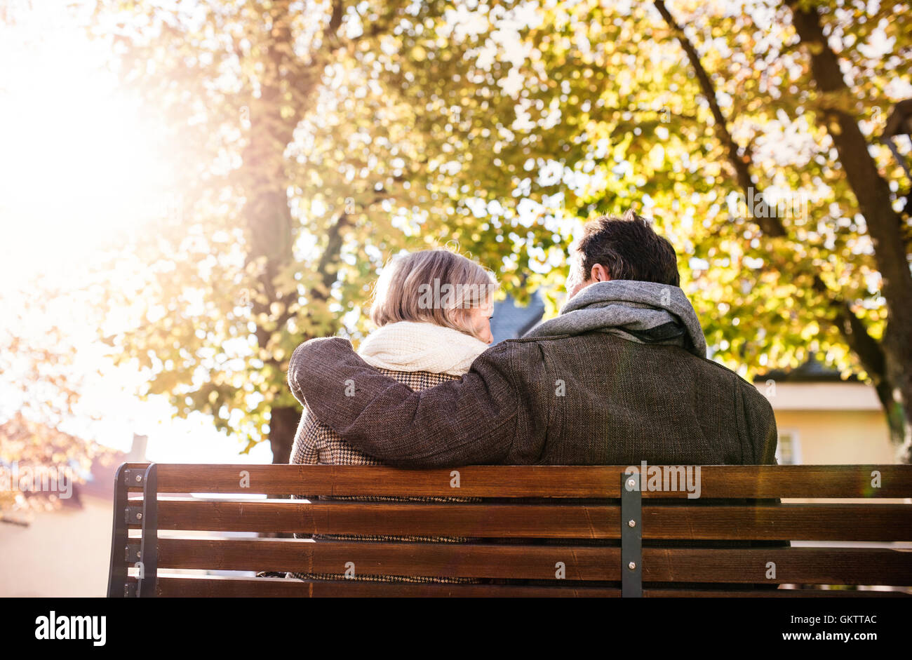 Elderly woman sitting rear view bench hi-res stock photography and ...